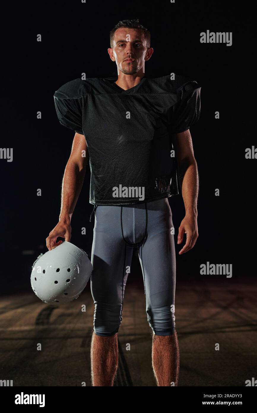 American Football Field: Lonely Athlete Warrior Standing on a Field ...