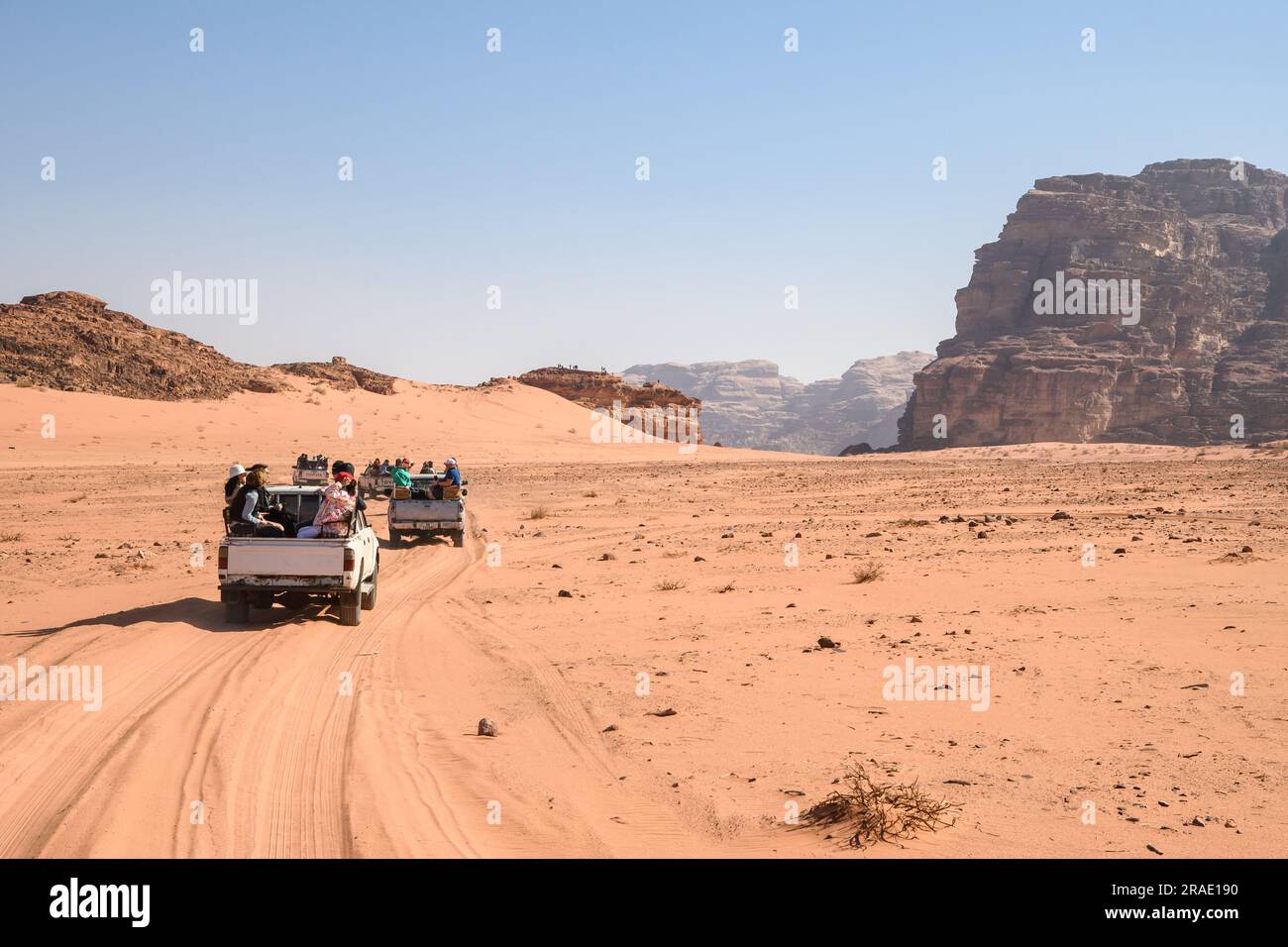 Wadi Rum, Jordan - December 19, 2022: A convoy of off-road vehicles ... Wadi Rum, Jordan - December 19, 2022: A convoy of off-road vehicles ...