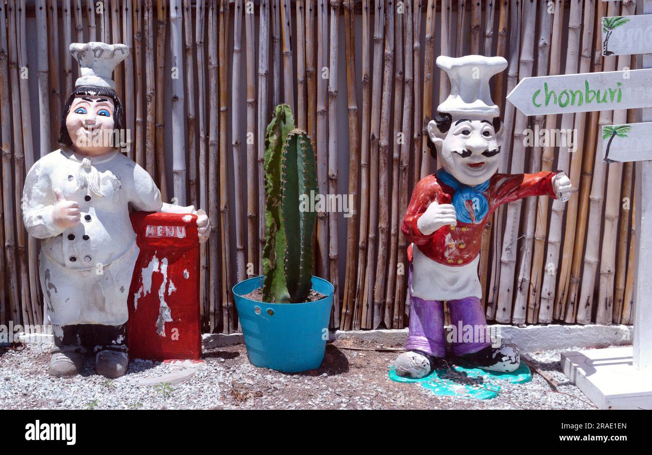 Small statues of chef figures at Pakarang Restaurant, at Laem Chabang ...