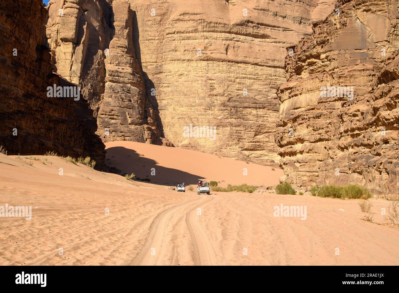 Wadi Rum, Jordan - December 19, 2022: A convoy of off-road vehicles ... Wadi Rum, Jordan - December 19, 2022: A convoy of off-road vehicles ...