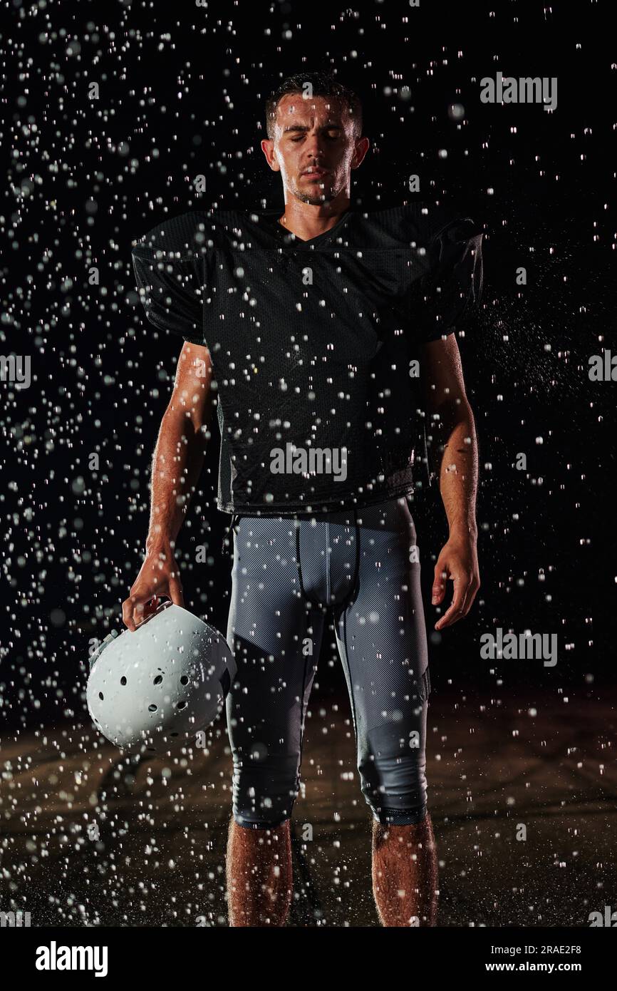 American Football Field: Lonely Athlete Warrior Standing on a Field ...