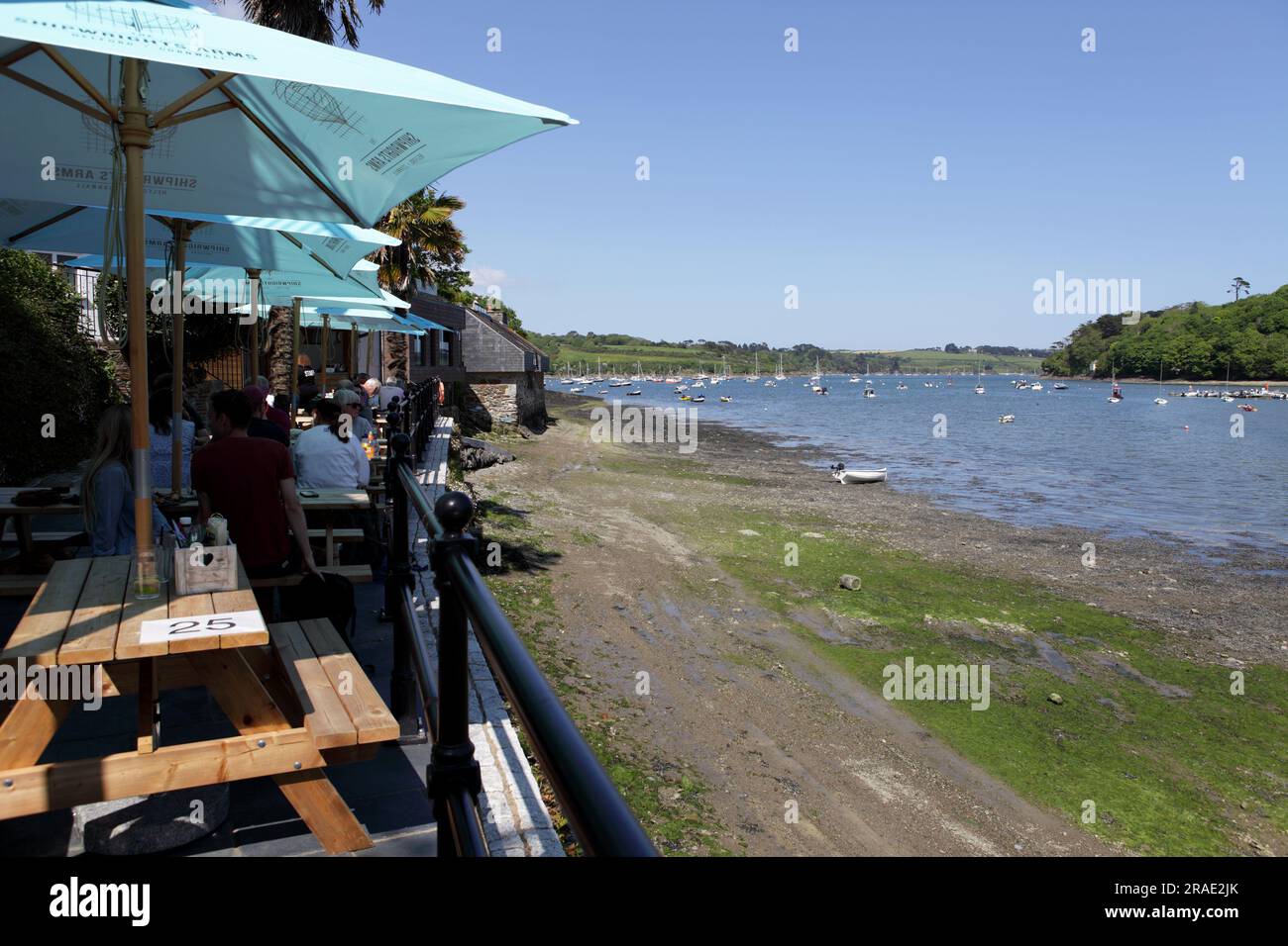 Visitors to Helford enjoying an afternoon drink and beautiful views at ...