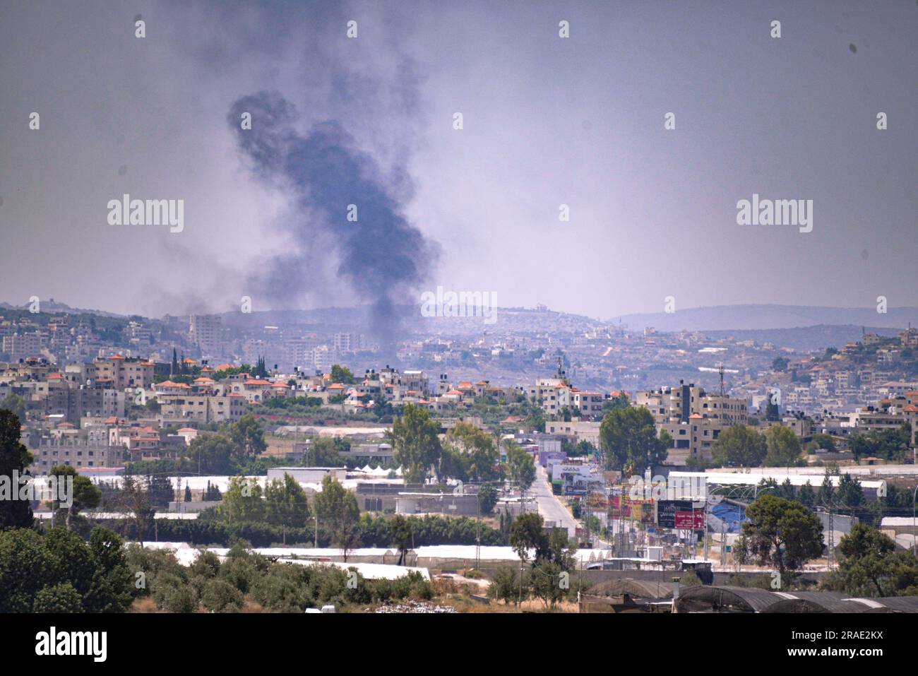 Israel. 03rd July, 2023. Pillars of smoke rise above the Palestinian ...