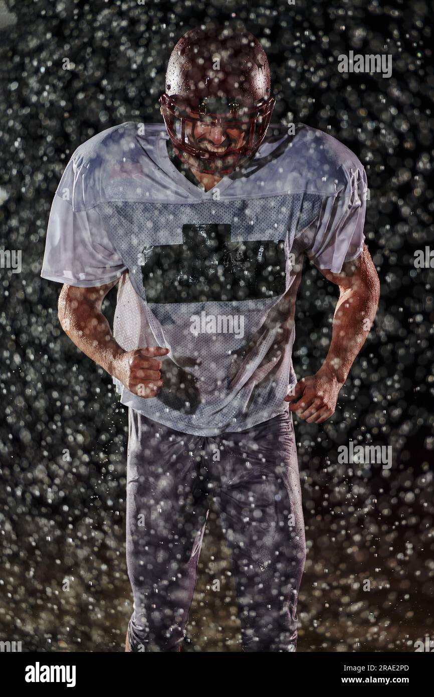 American Football Field: Lonely Athlete Warrior Standing on a Field ...