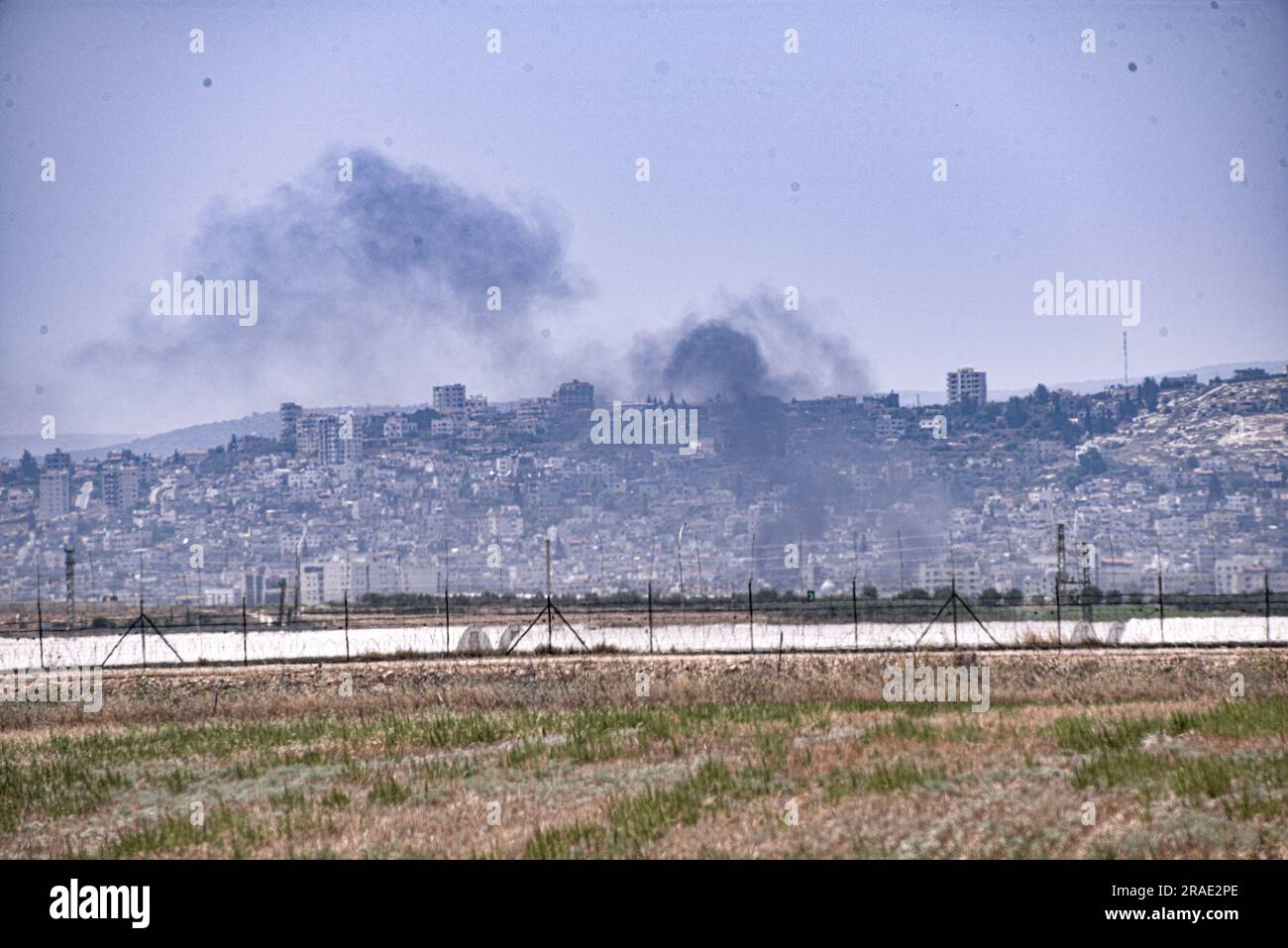 Israel. 03rd July, 2023. Pillars of smoke rise above the Palestinian ...
