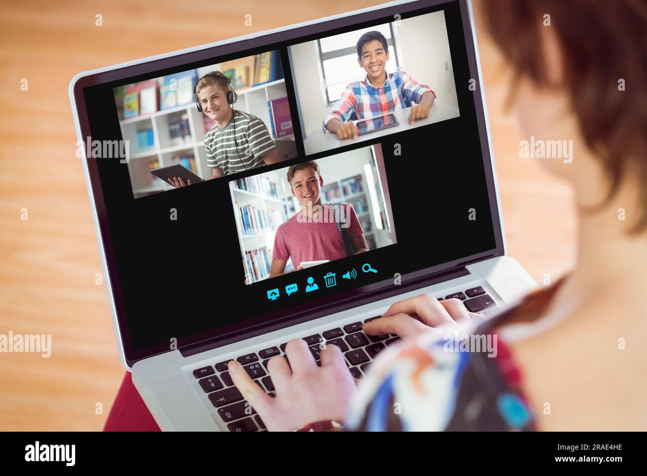 Happy diverse male students with female teacher having class during ...