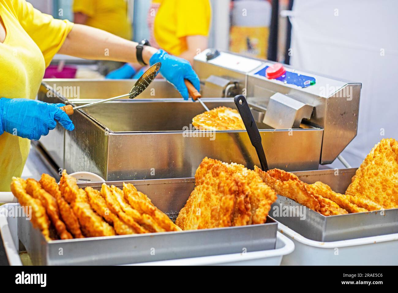 get cooked hot fried cheburek. street food Stock Photo - Alamy