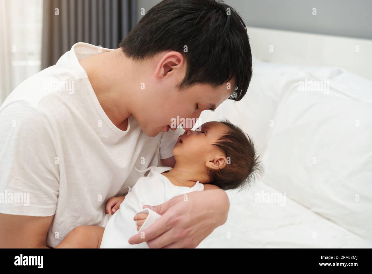 Daughter nose kissing hi-res stock photography and images - Alamy