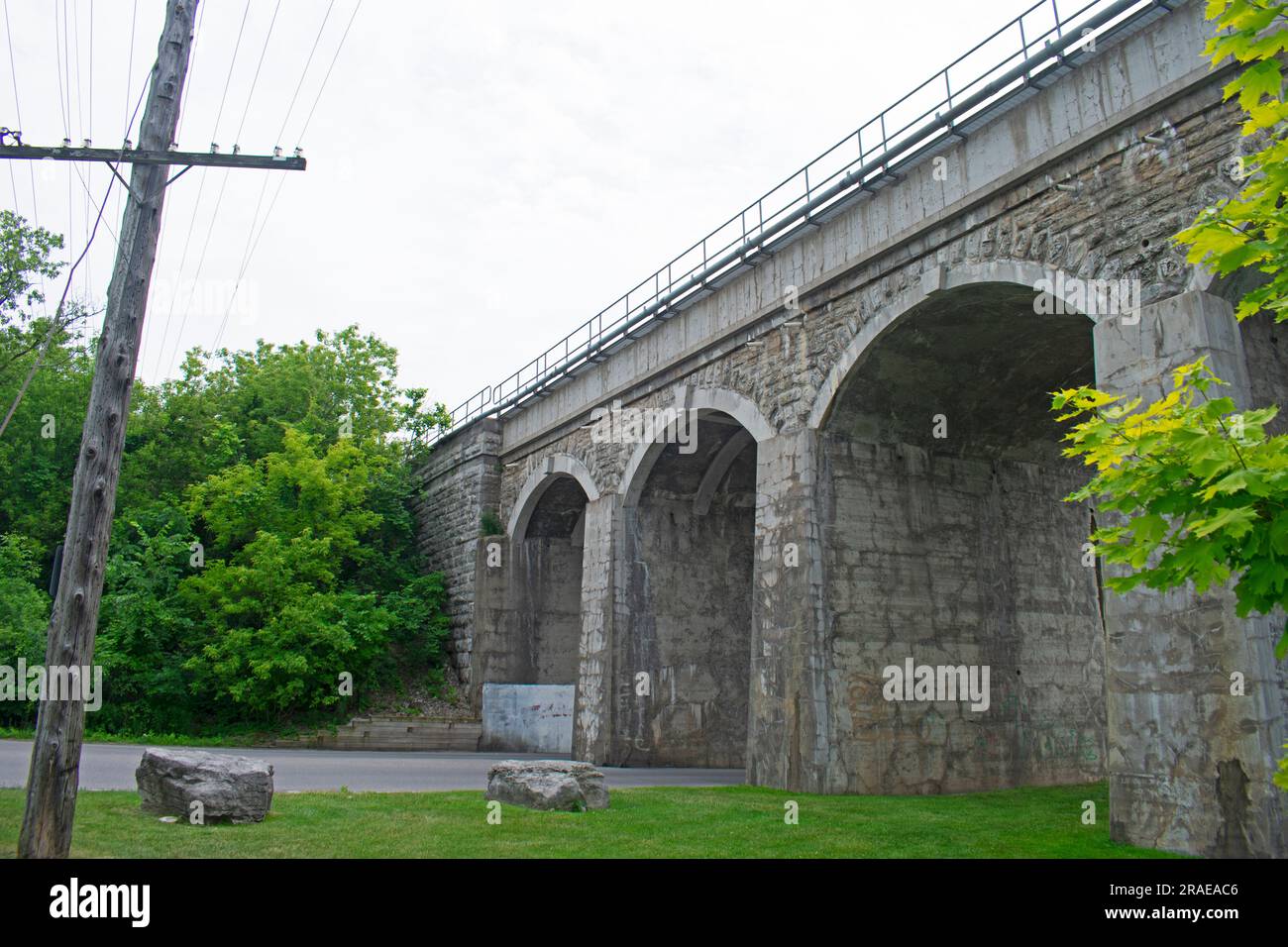 Railroad bridge supported by beautiful stone arches, crossing the ...