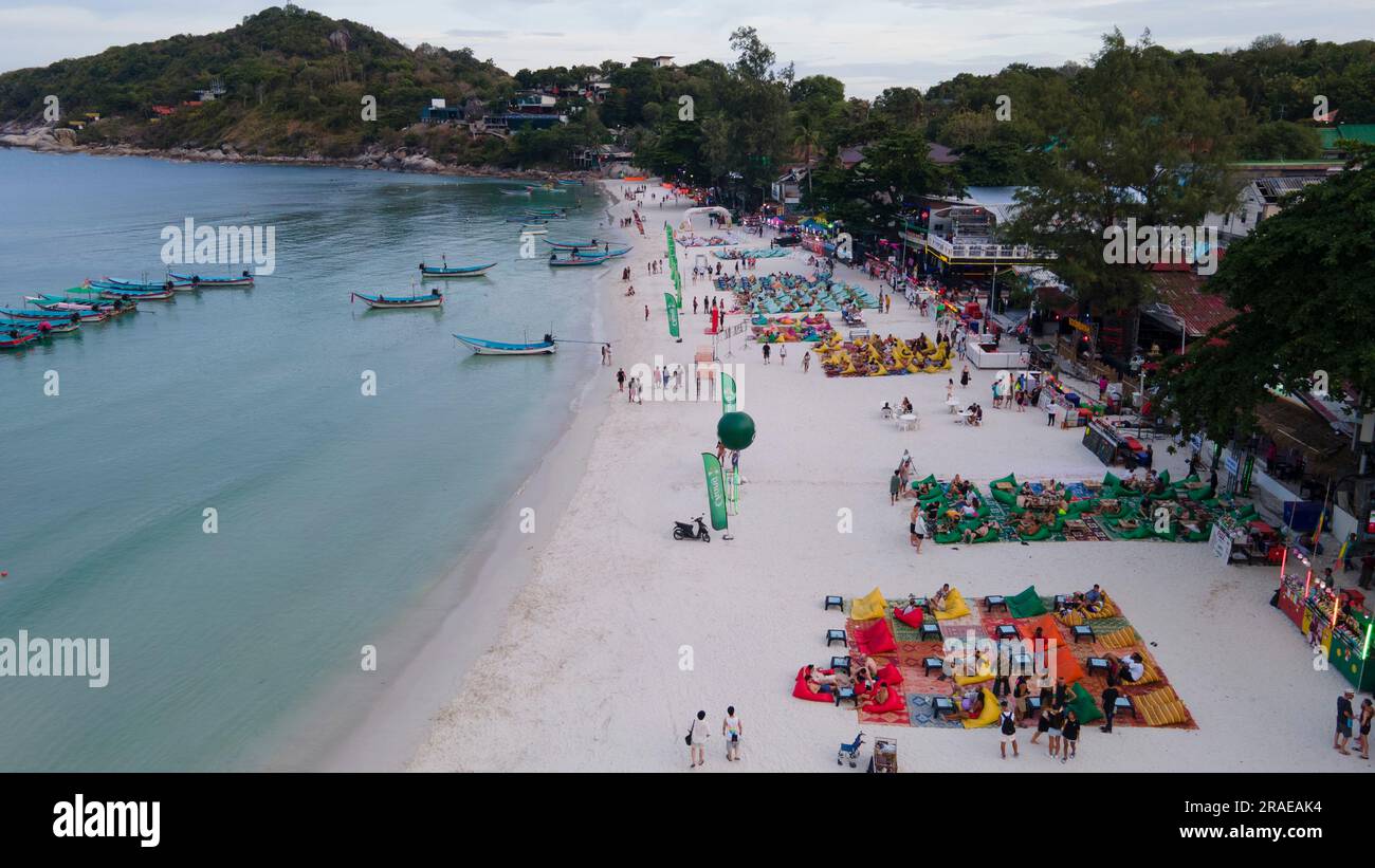 People attend the Full Moon Party on Hat Rin beach on Koh Phangan ...