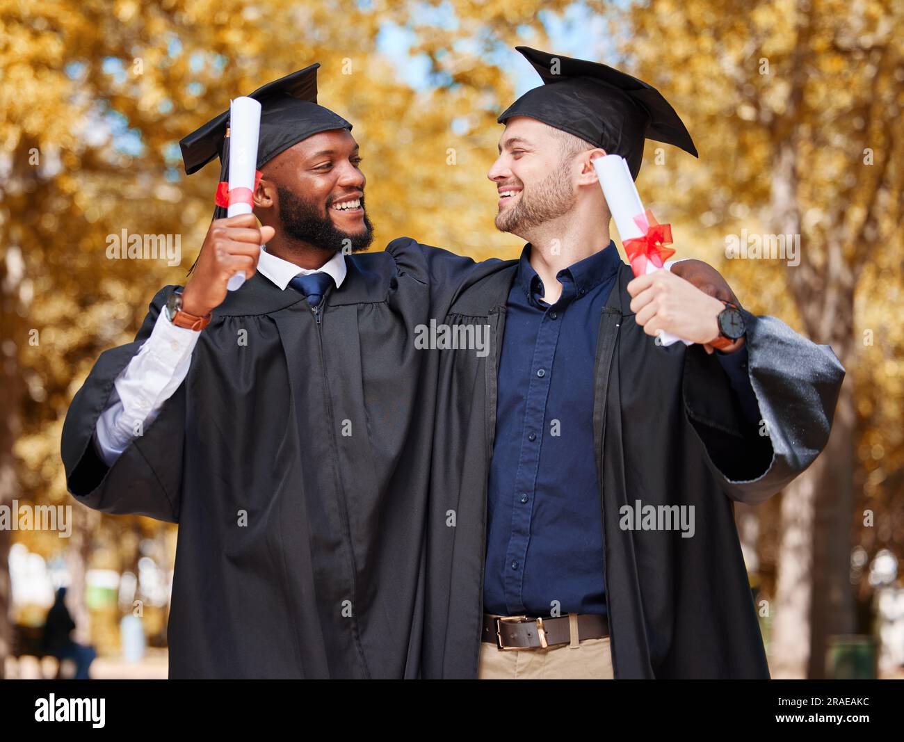 Graduation, students and couple of friends on university, or campus ...