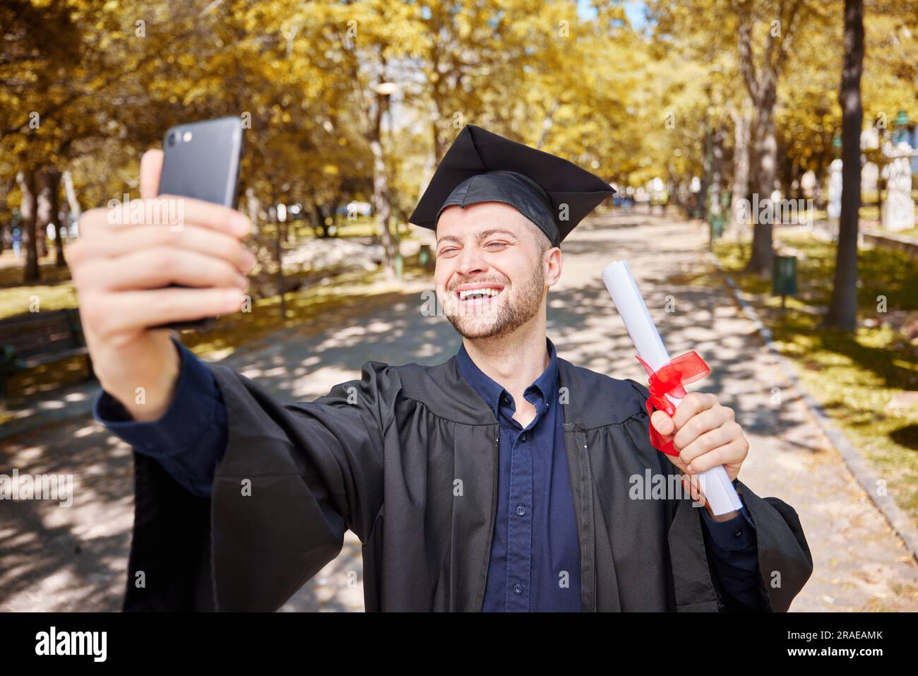 Graduation selfie, college student and man on campus, university and ...
