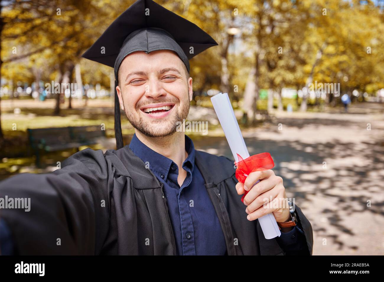 Man, graduation selfie and certificate for college student, smile and ...