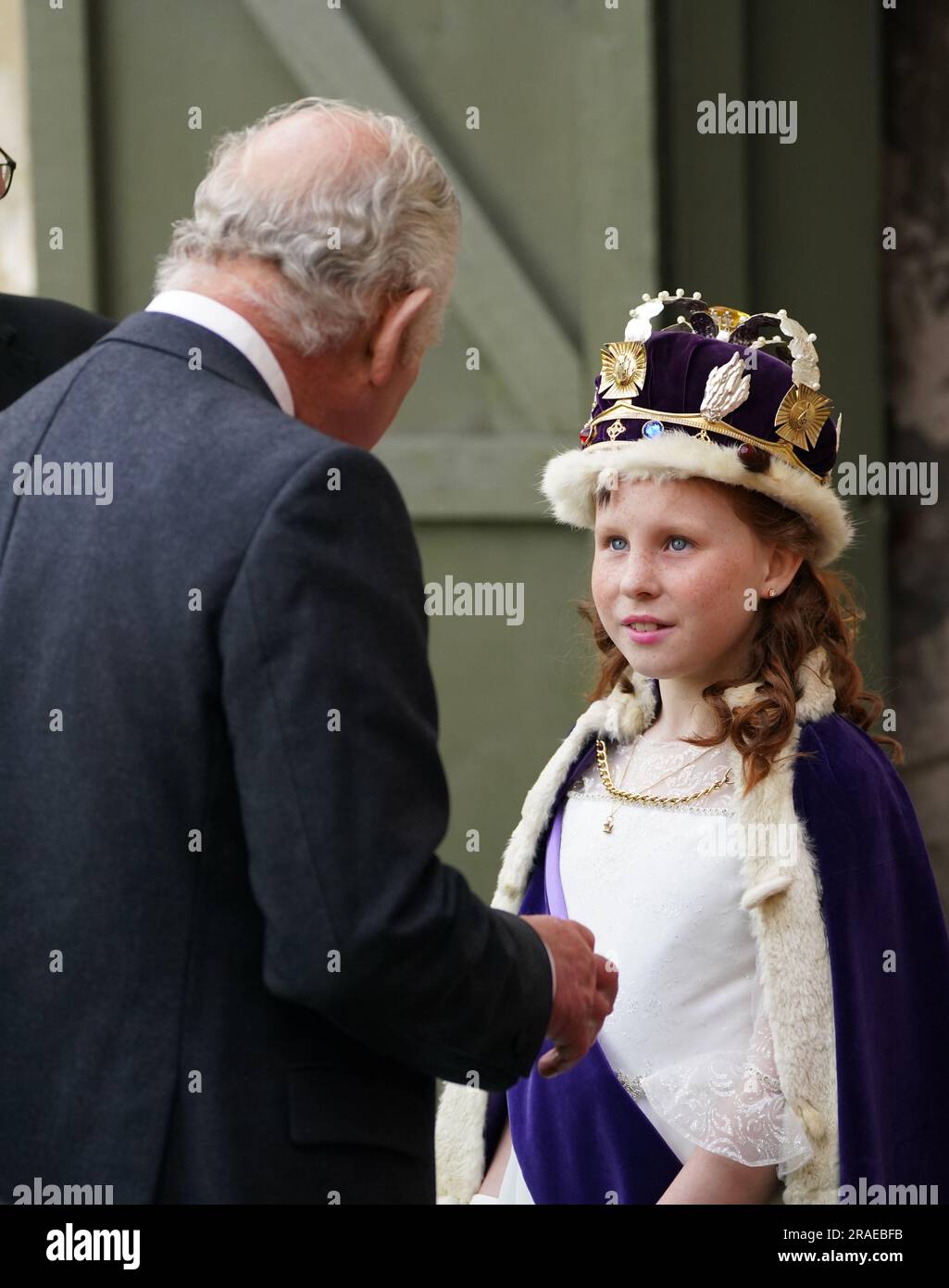 King Charles III greets the Bo'ness Fair Queen, Lexi Scotland, during ...
