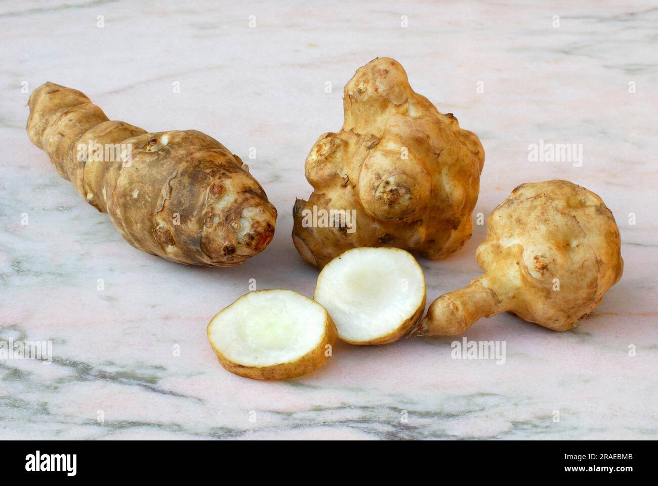 Jerusalem artichoke (Helianthus tuberosus) roots, roots, pear ...