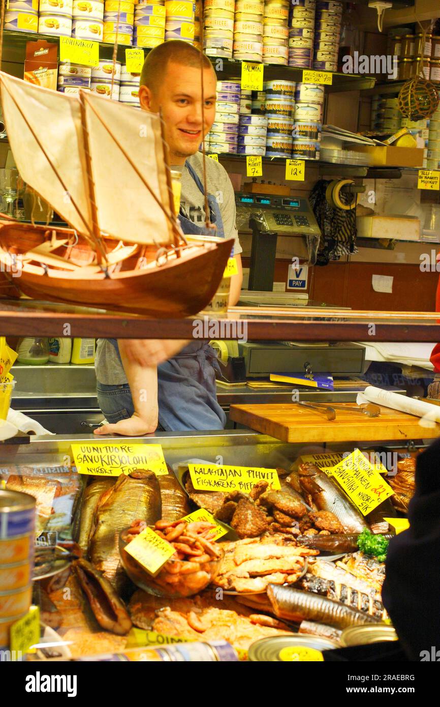Vendor in fish shop, old market hall, Helsinki, fish shop, Finland ...