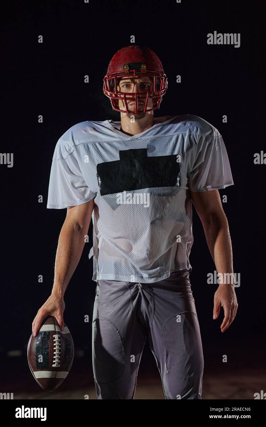 American Football Field: Lonely Athlete Warrior Standing on a Field ...