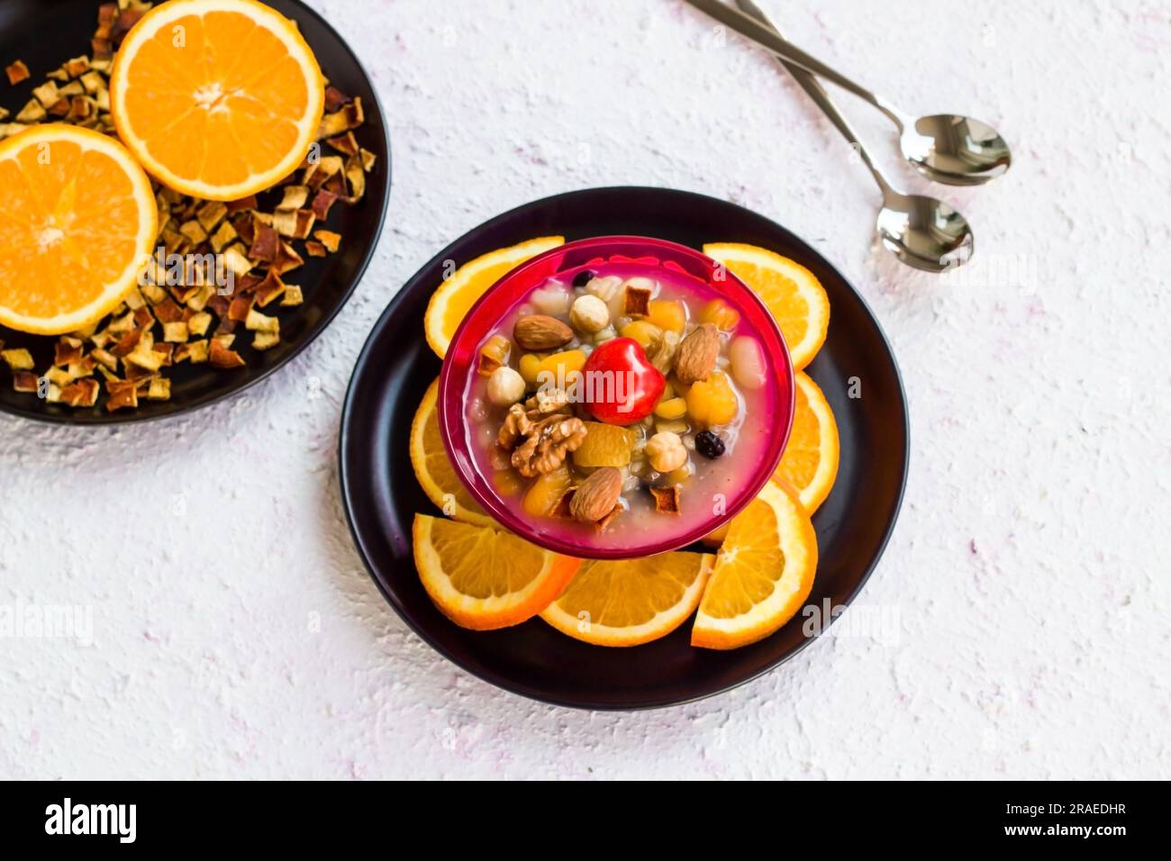Traditional Turkish Orange Ashura Dessert, designed with sliced oranges ...