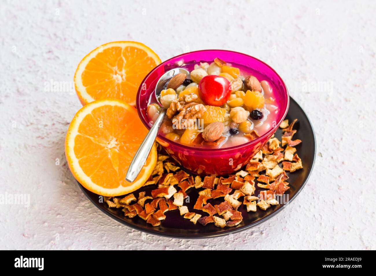 Traditional Turkish Orange Ashura Dessert, designed with sliced oranges ...