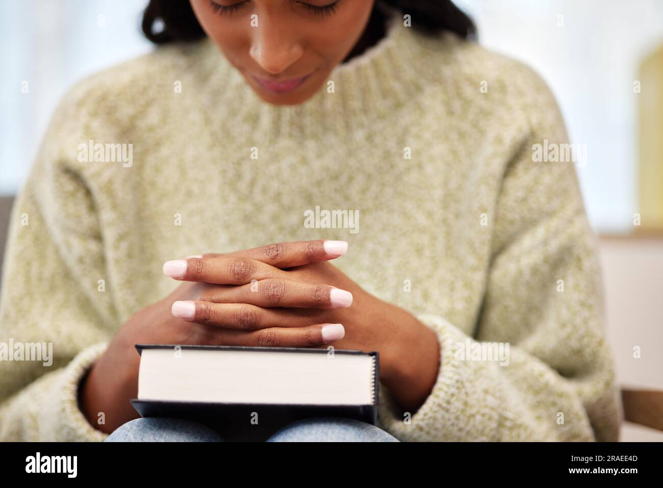 Bible, hands and woman praying for help, faith or gratitude to God ...