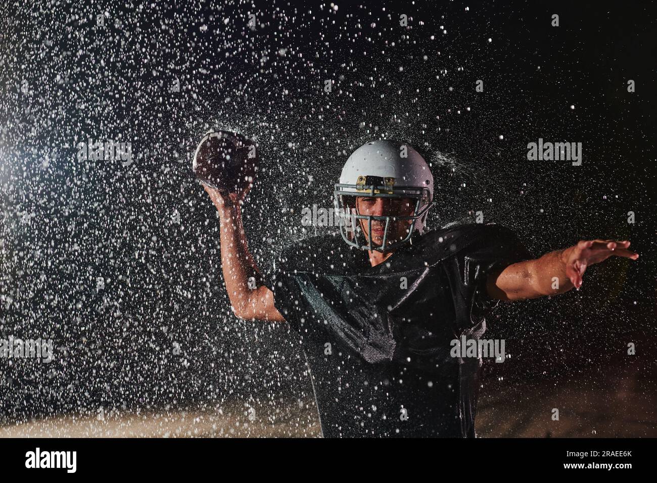 American Football Field: Lonely Athlete Warrior Standing on a Field ...