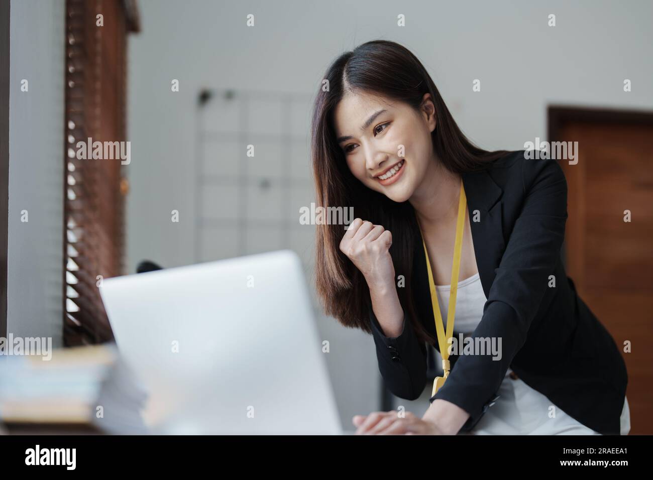 Portrait of a woman business owner showing a happy smiling face as he ...