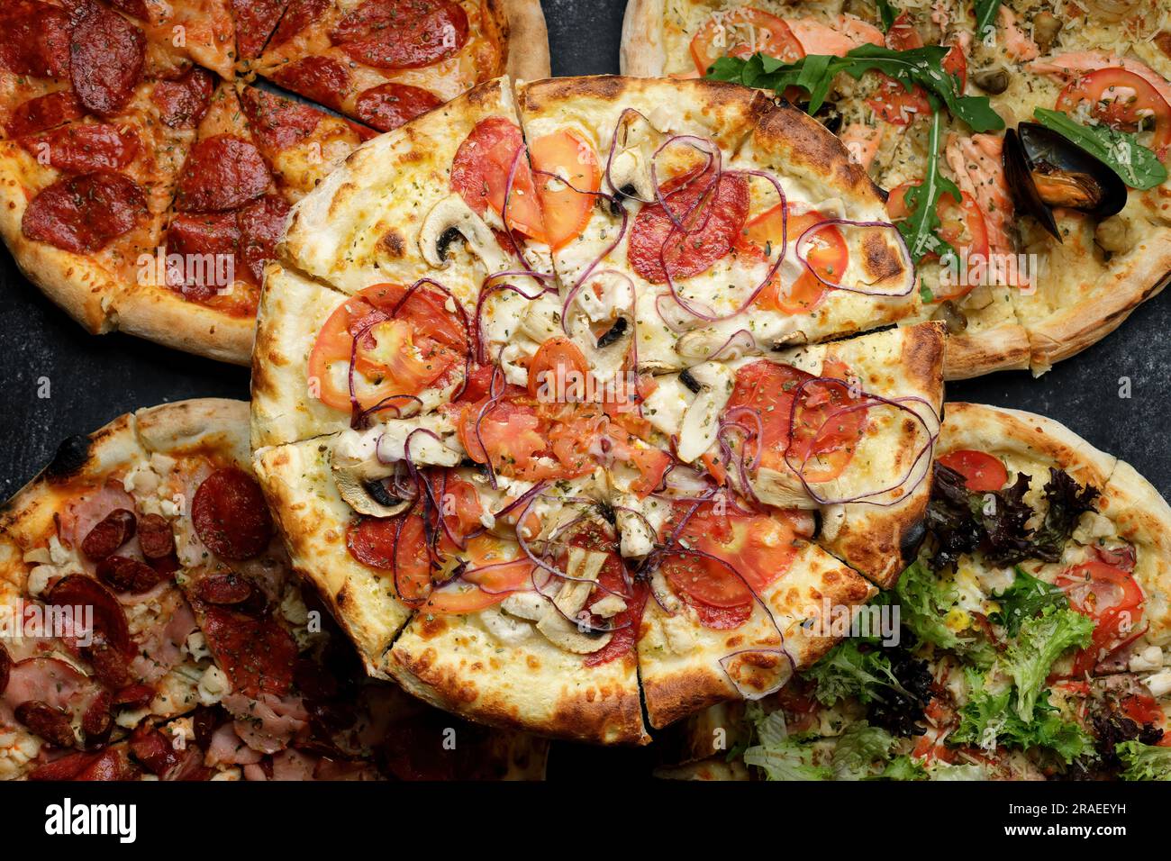 Five different types of pizza with different toppings Stock Photo - Alamy