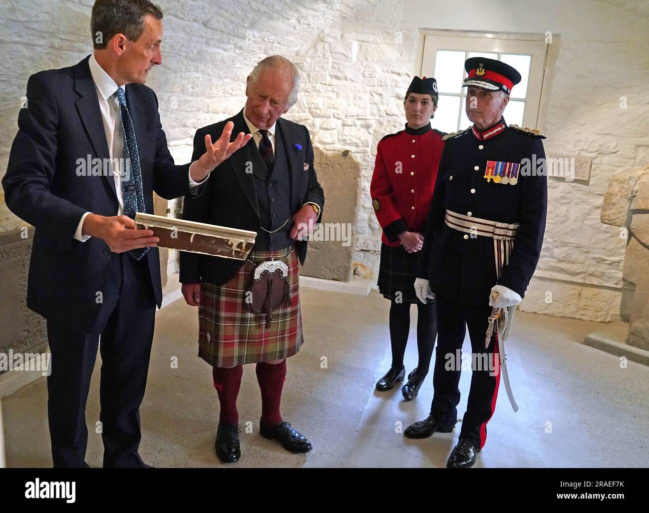 King Charles III (2nd left) during his visit to Kinneil House in ...