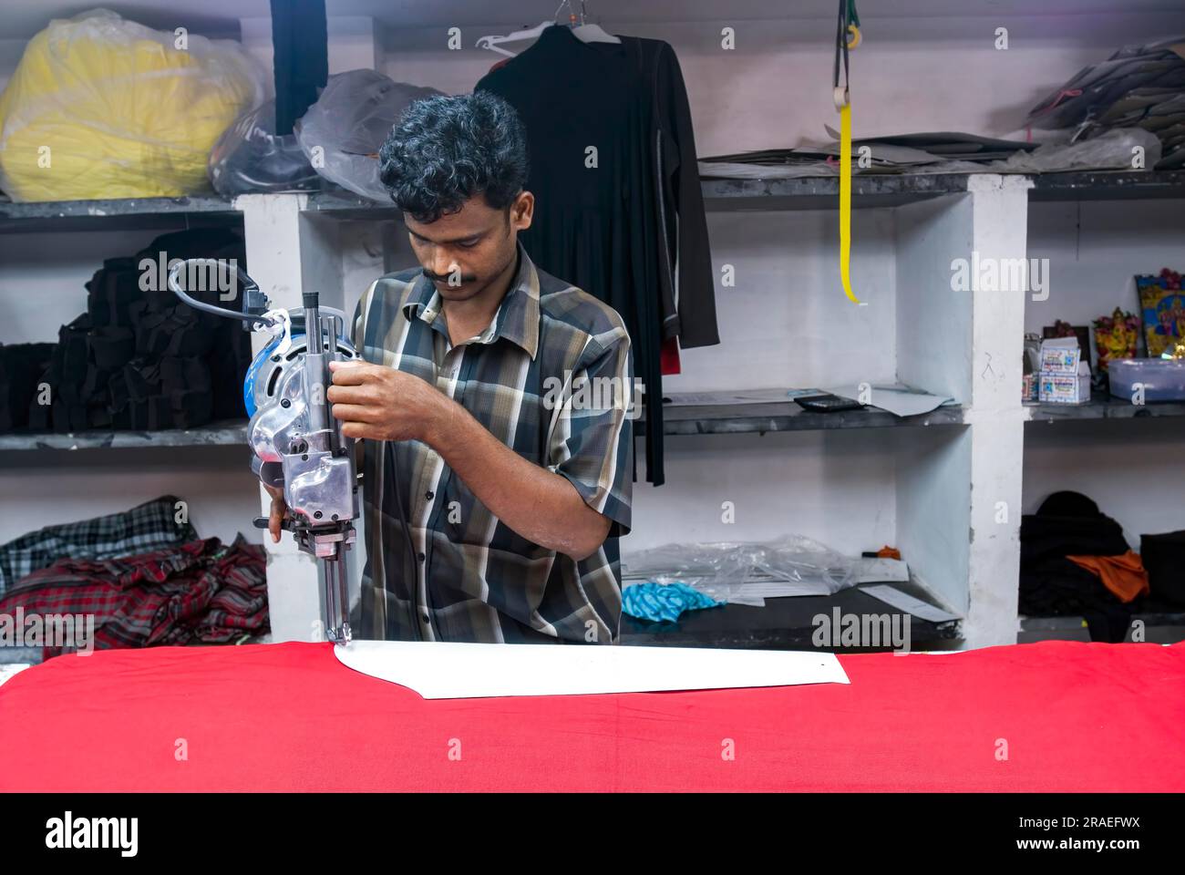 Fabric cutting through cutter in a garment industry, Tiruppur Tirupur ...
