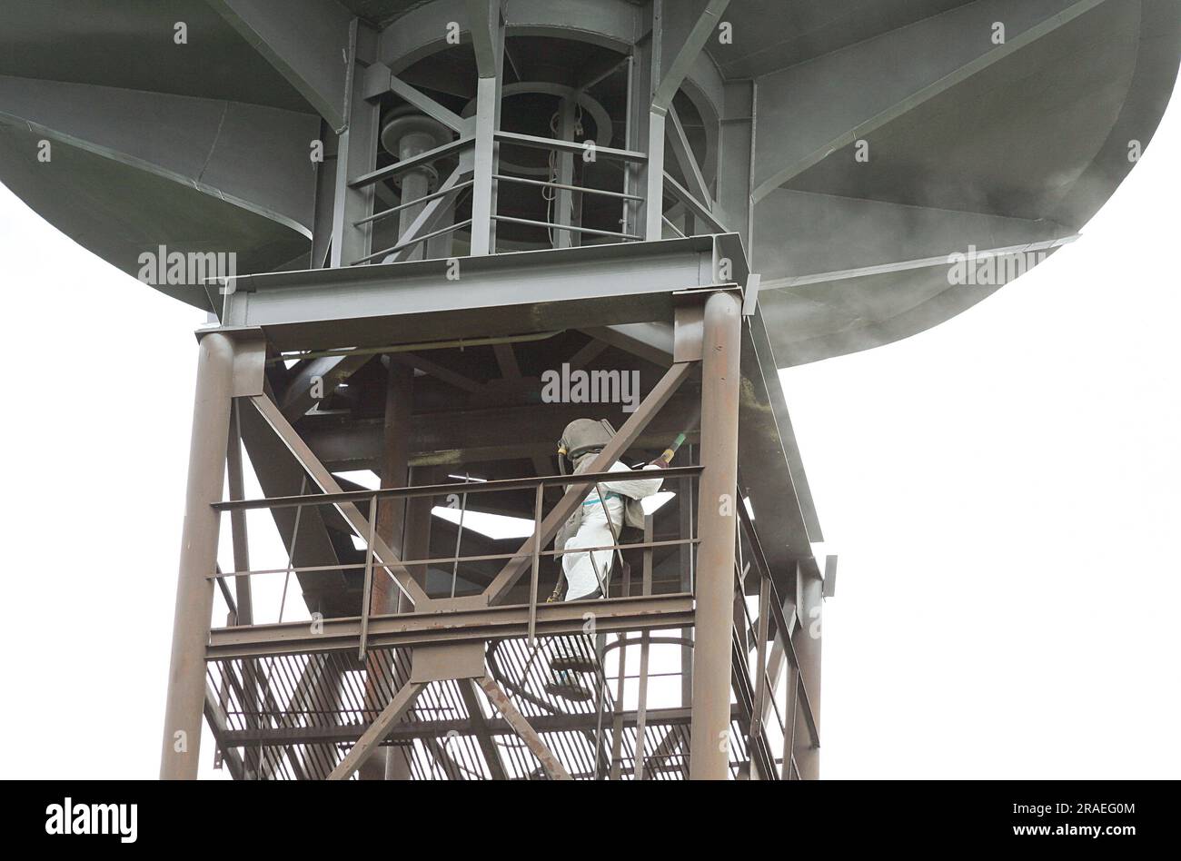 Sandblasting process. Cleaning the metal construction surface from rust ...