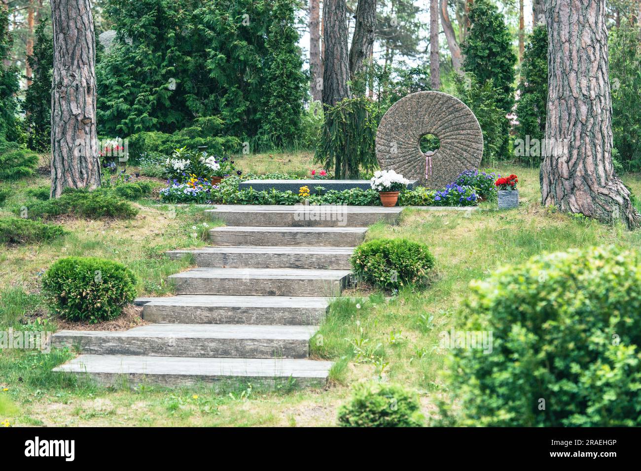 Ragaciems, Latvia - May 25, 2023: A grave of famous Latvian poet Imants ...