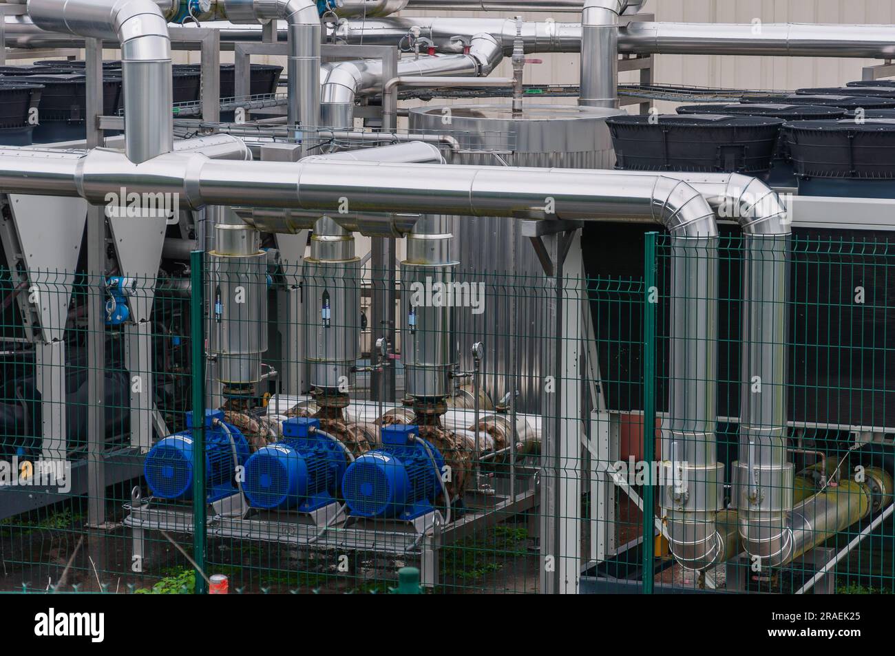 Equipment, cables and pipelines outside a modern cheese factory in ...
