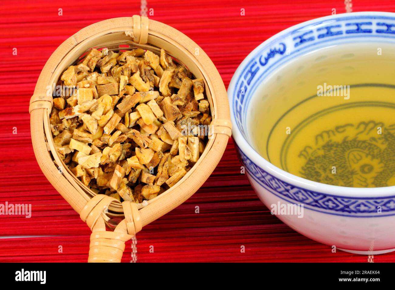 Cup of Angelica pubescens root tea (Angelicae pubescentis Radix ...