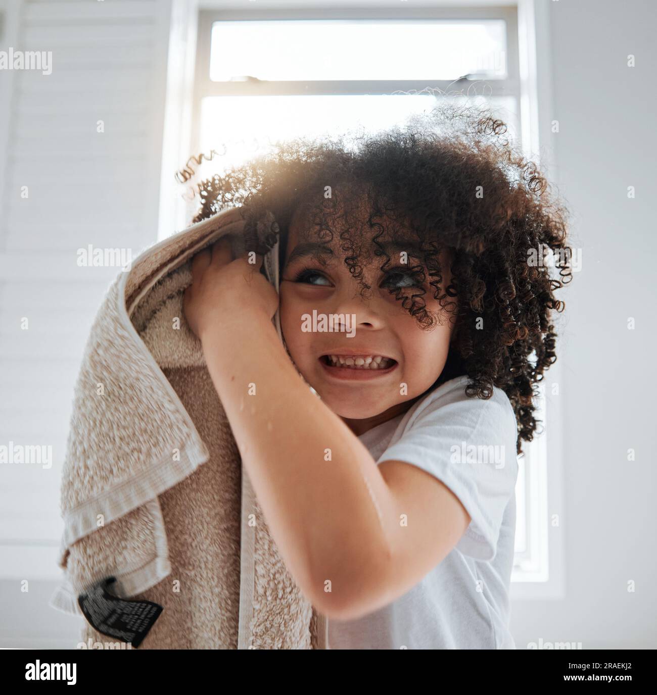 Bathroom, towel or child washing hair in shower in daily morning ...