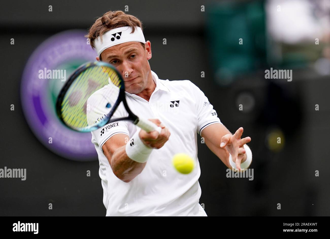 Casper Ruud in action against Laurent Lokoli (not pictured) on day one ...