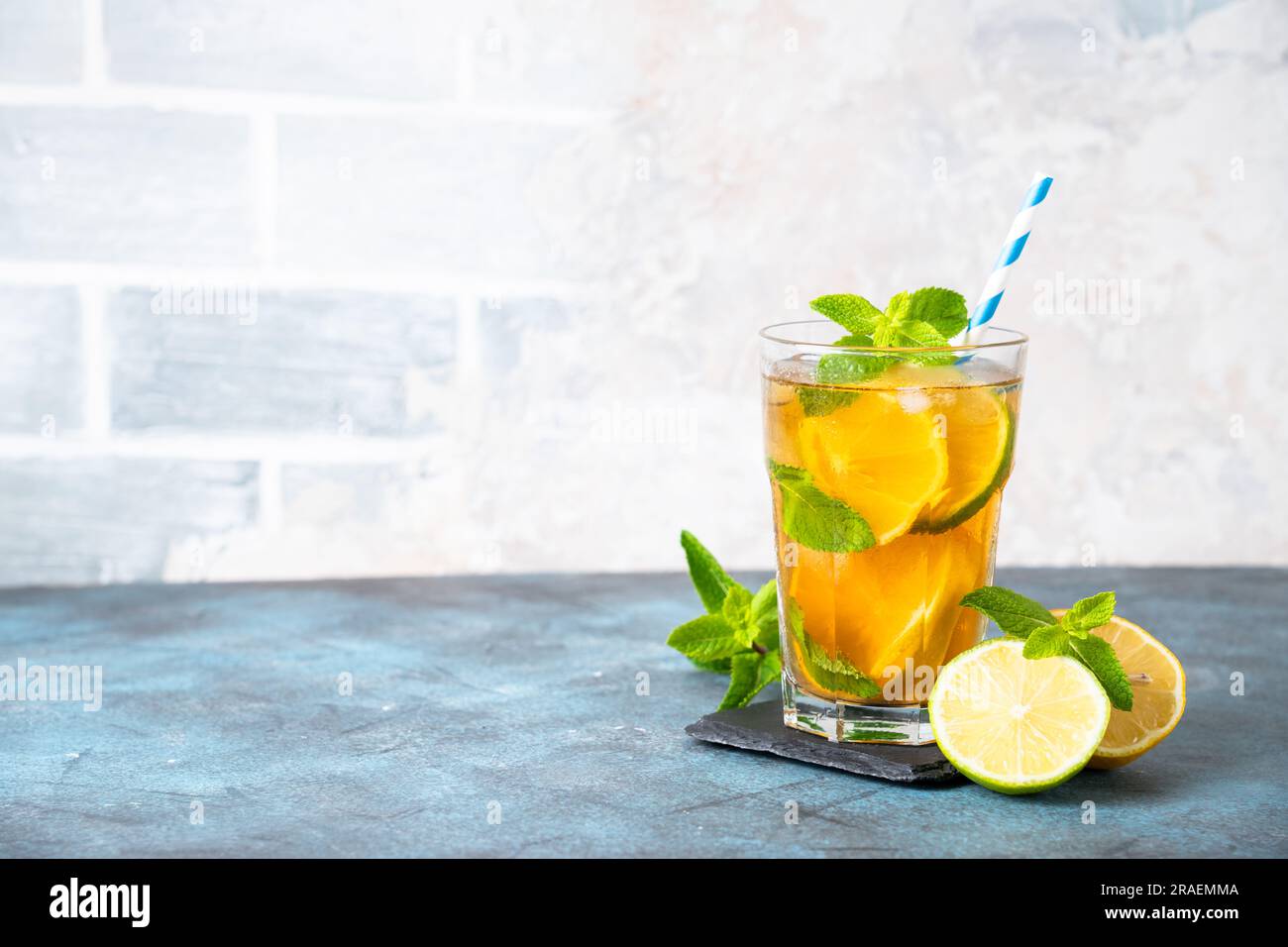 Iced tea with lemon, lime, mint and ice Stock Photo - Alamy