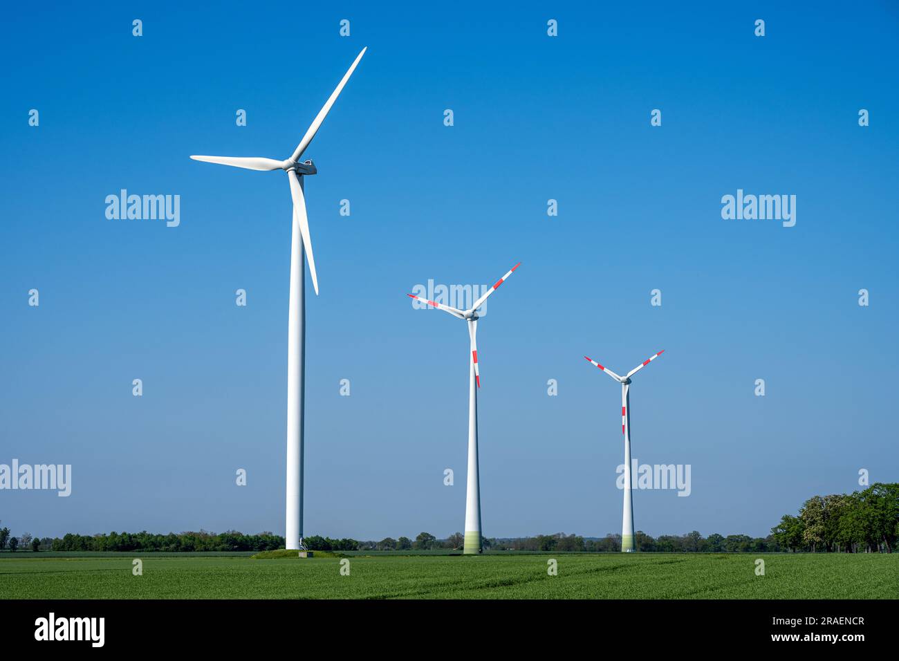 Three modern wind turbines seen in Germany Stock Photo - Alamy