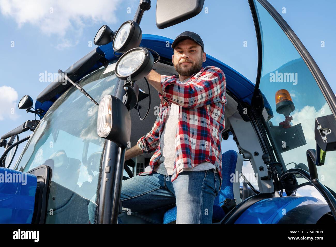 Farmer posing with tractor hi-res stock photography and images - Alamy
