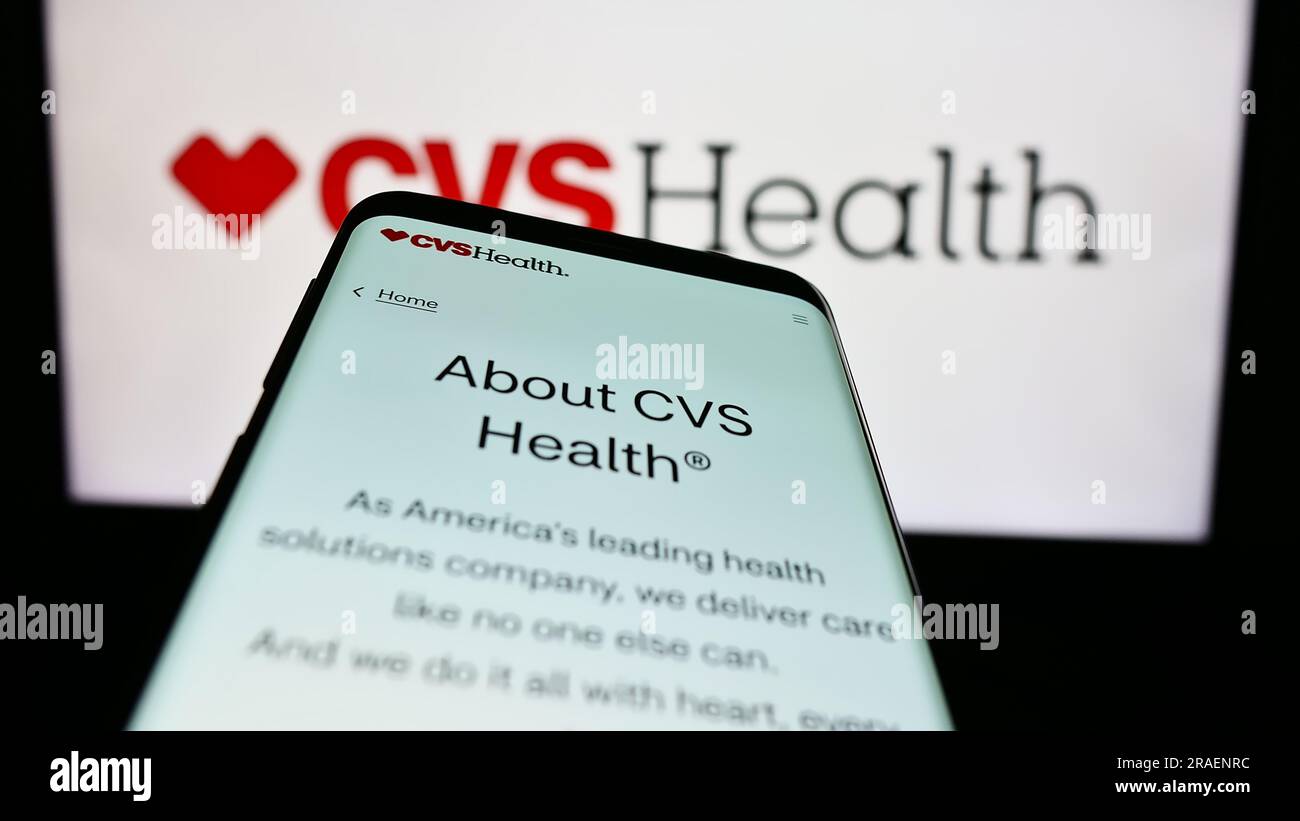 Smartphone with web page of US healthcare company CVS Health ...