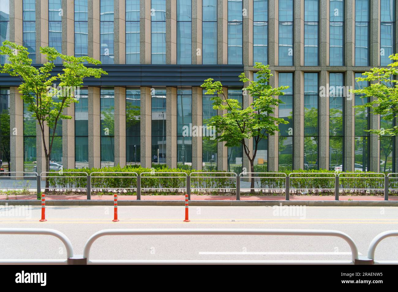 A blocking fence is installed in the middle of the road to prevent ...