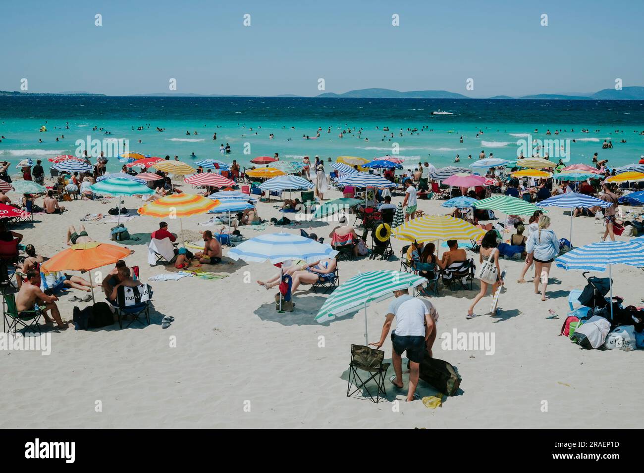 Izmir, Turkey. 30th June, 2023. People seen enjoying at the beach. With ...