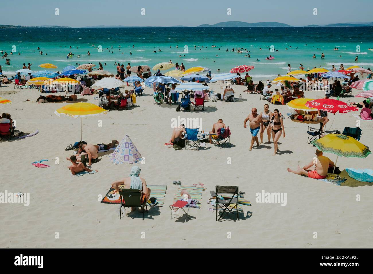 Izmir, Turkey. 30th June, 2023. People seen under the umbrellas set up ...