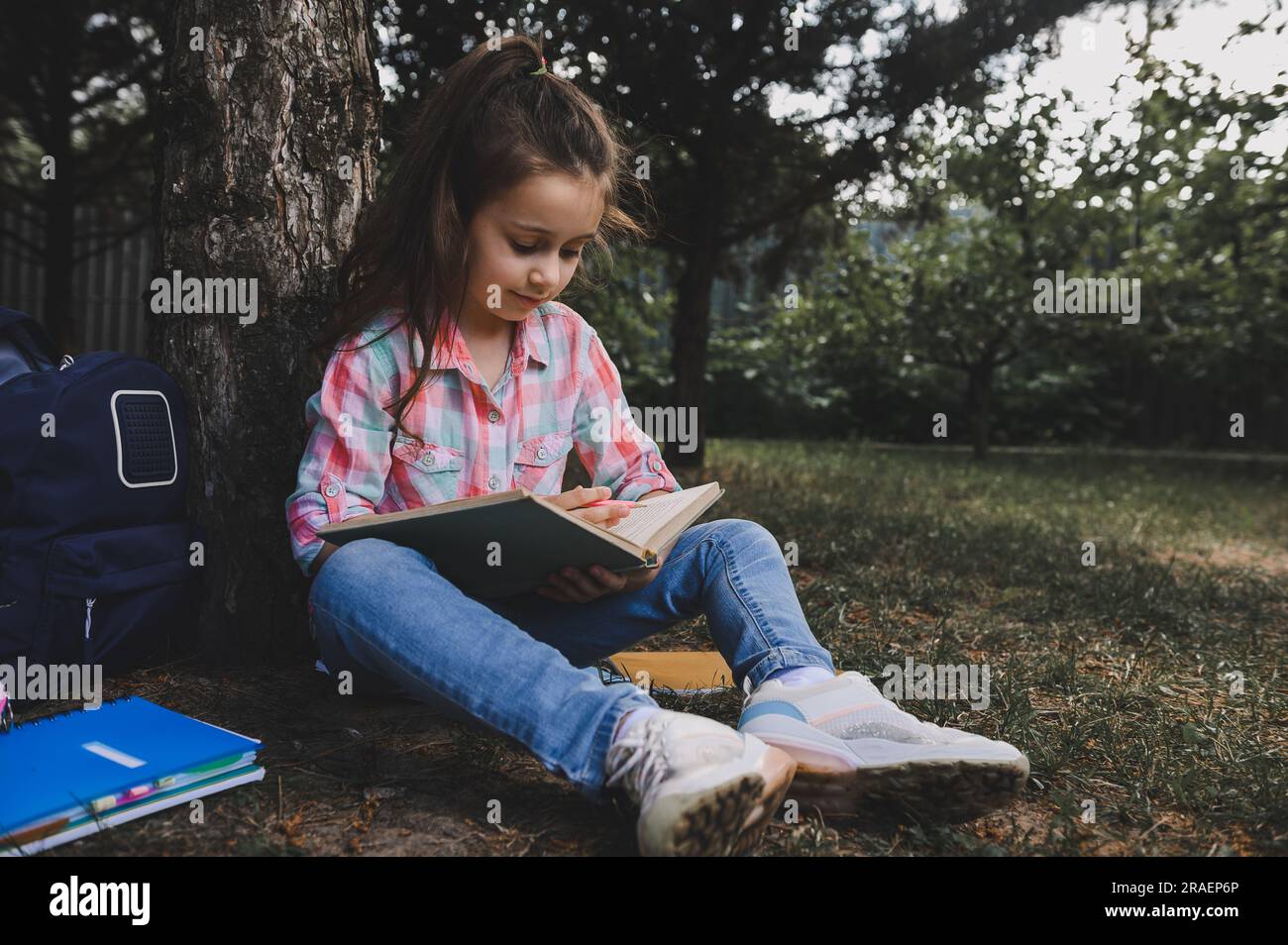 Beautiful Caucasian diligent little child 6 years old, primary school ...