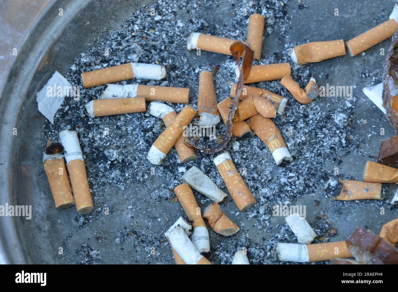 Tray with cigarette in the ashtray Stock Photo - Alamy