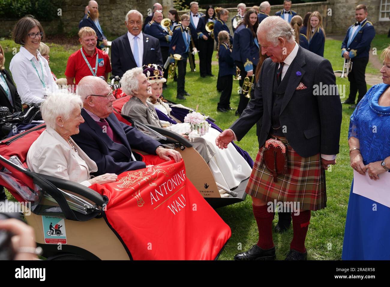 King Charles III (right) during his visit to Kinneil House in Edinburgh ...