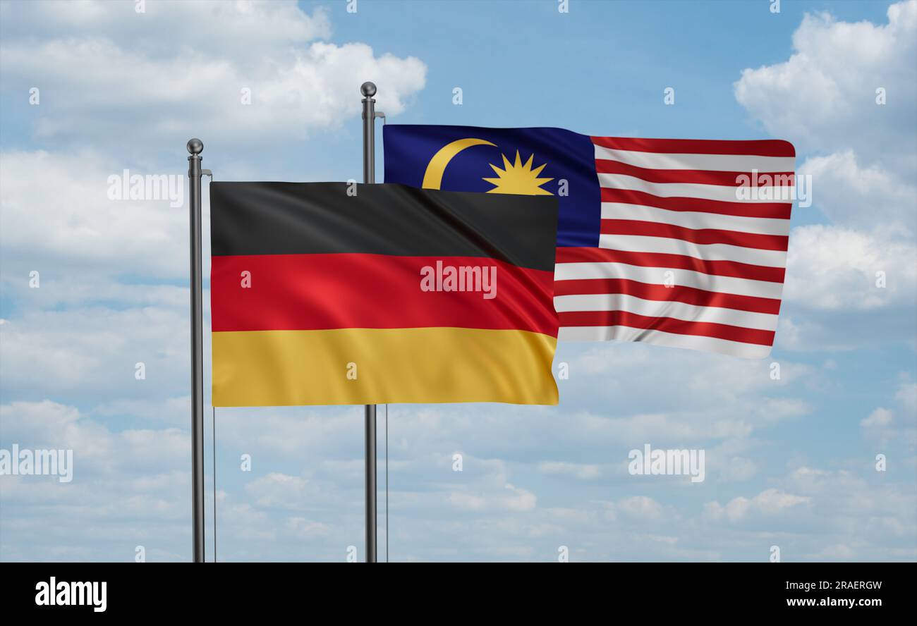 Malaysia and Germany flag waving together in the wind on blue sky, two ...