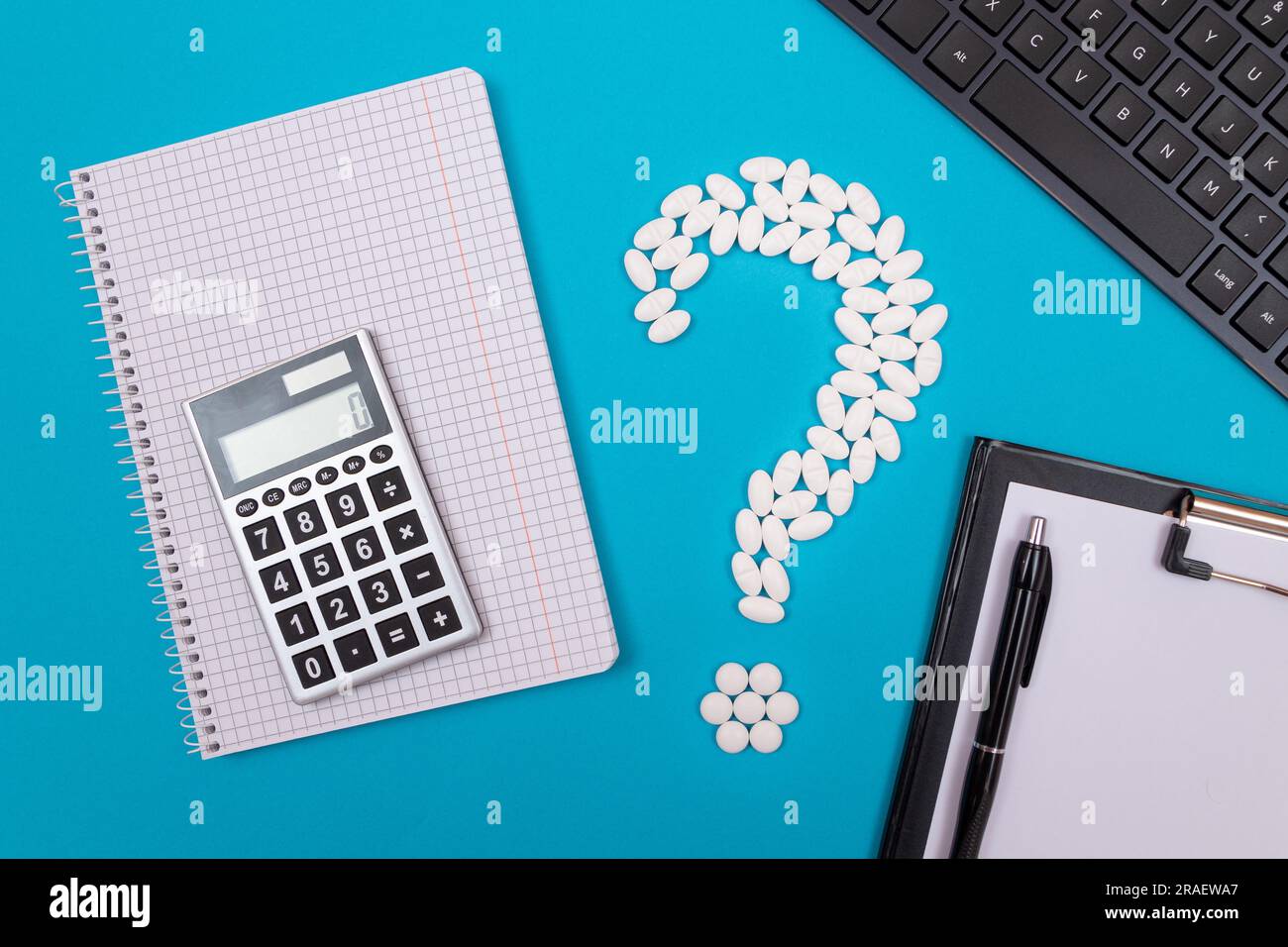 Treatment Costs and Budget. Question Mark Made from White Pills and ...