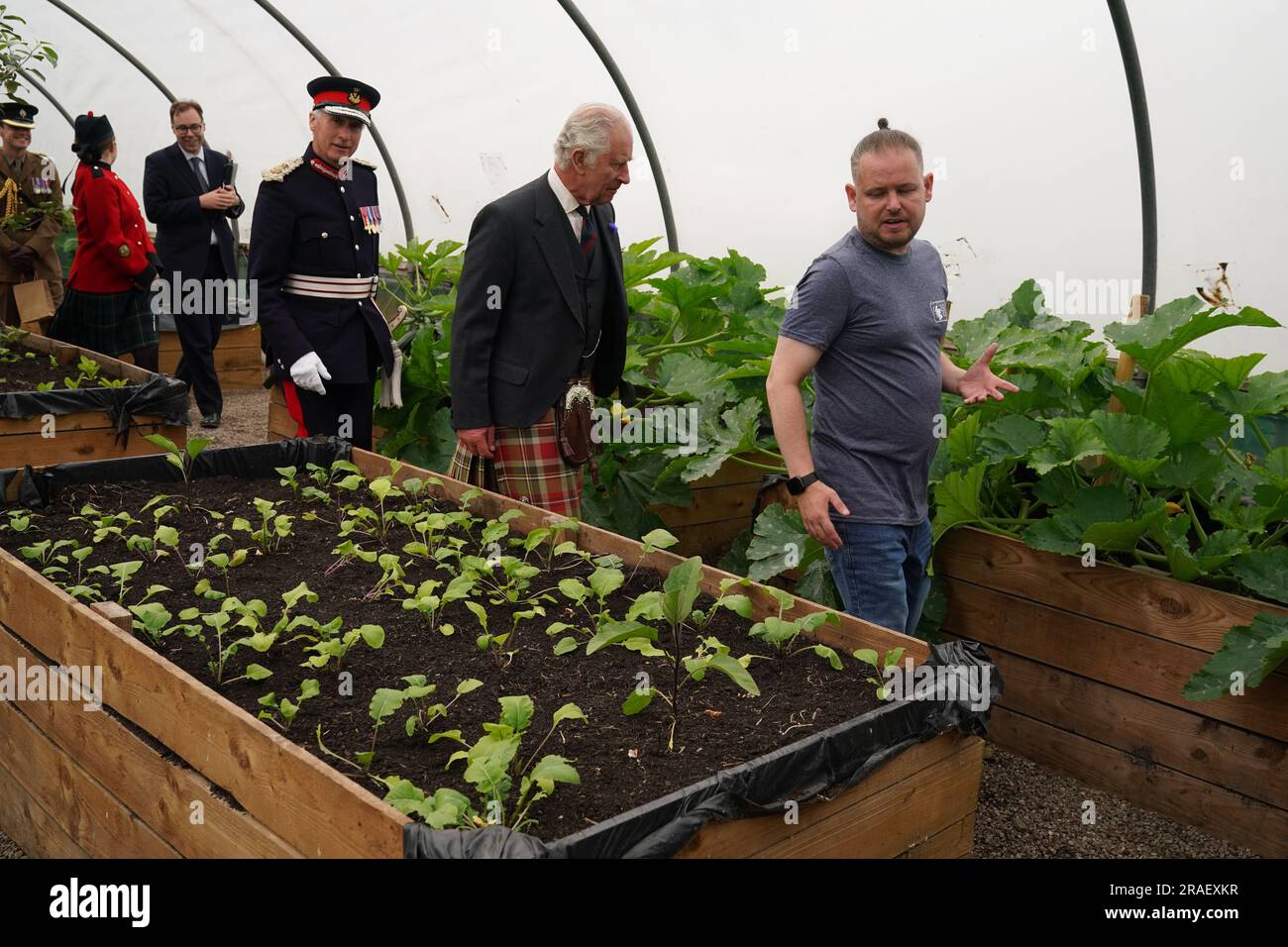 King Charles III (centre) during his visit to Kinneil House in ...