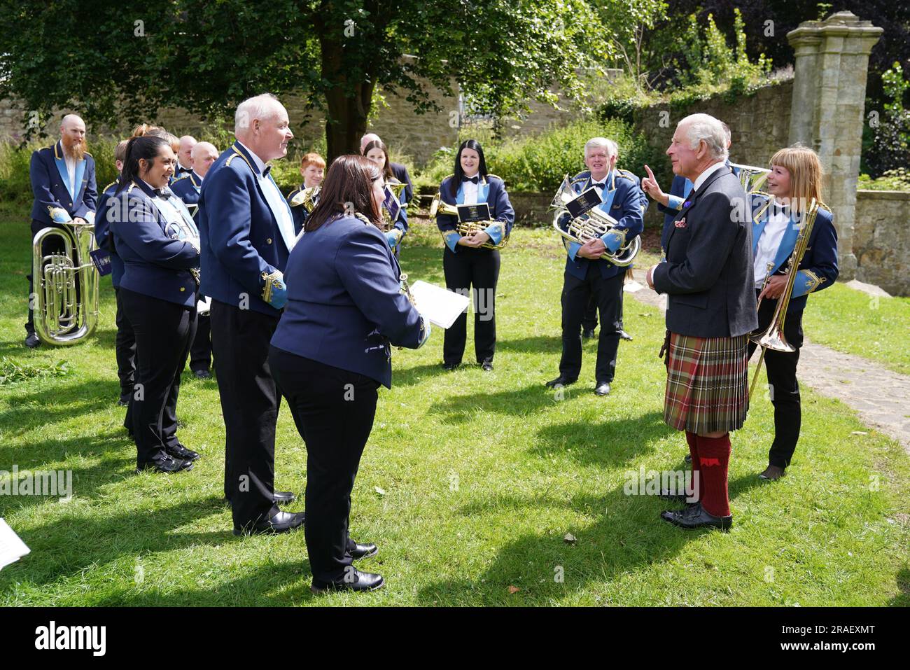 King Charles III (centre right) during his visit to Kinneil House in ...