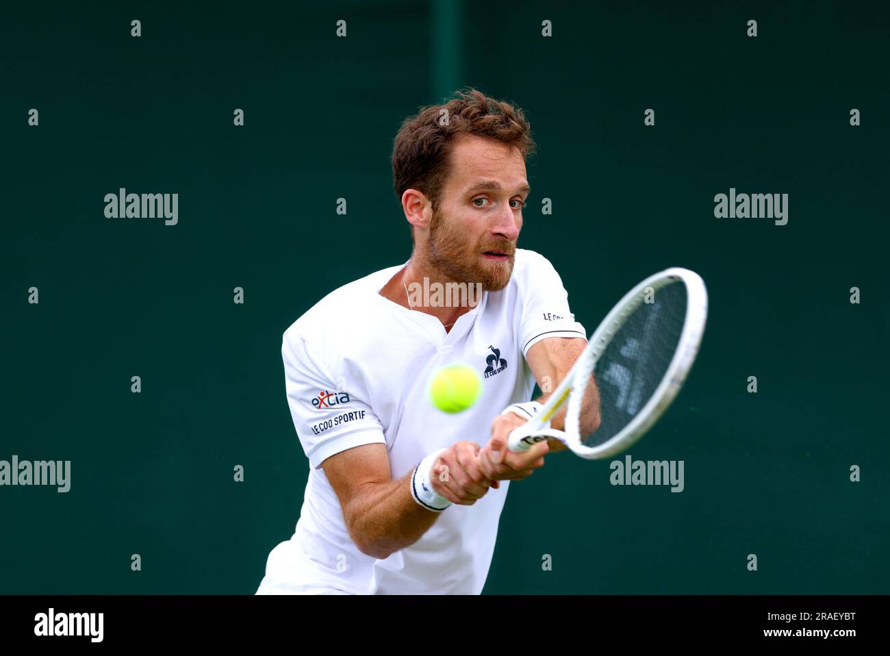 Constant Lestienne in action during his Gentlemen's Singles match ...